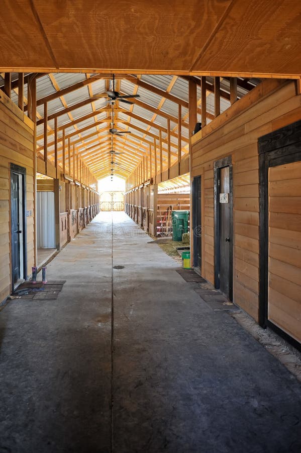 Stable stock image. Image of fans, brown, yellow, path - 25927859