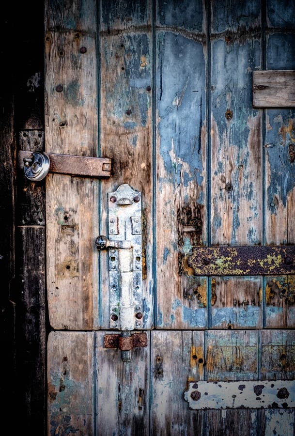 Closeup of a Door with a Distressed Paint Finish and a Rusted Door ...