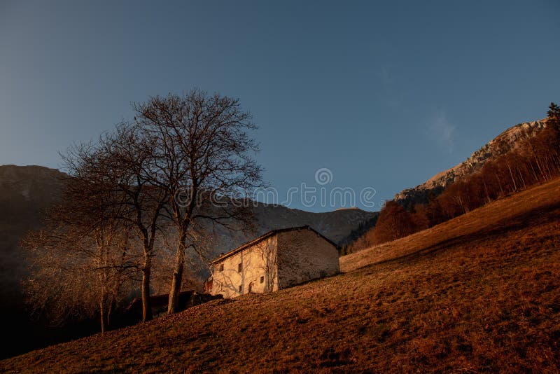 Stall in the Mountains at Sunset Stock Photo - Image of rock, outdoor ...