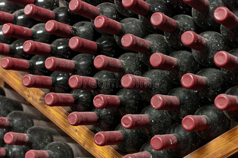 Stack of Aging Red Wine Bottles Stock Image - Image of basement, rack ...