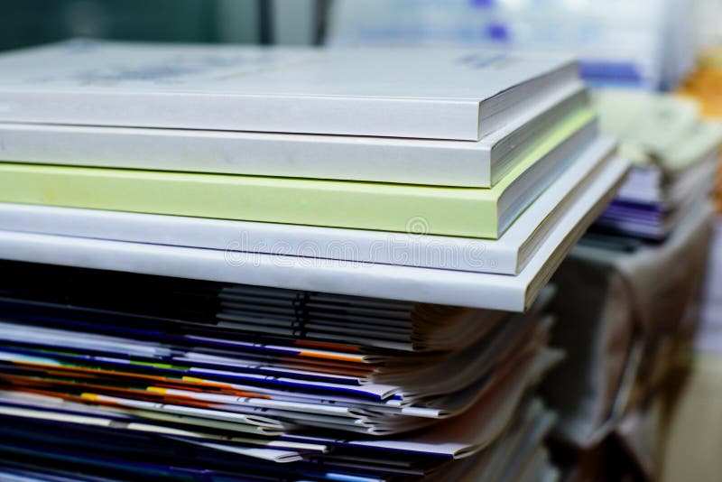 A Stack of Annual Report Books on the Table in the Office Stock Image ...