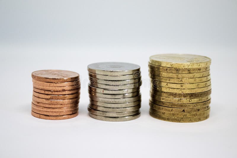 Stack of Arranged Coins on a White Background Stock Photo - Image of ...