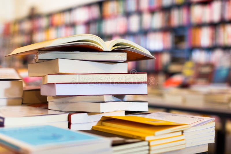 Stack of Books Lying on Table in Bookstore Stock Image - Image of ...