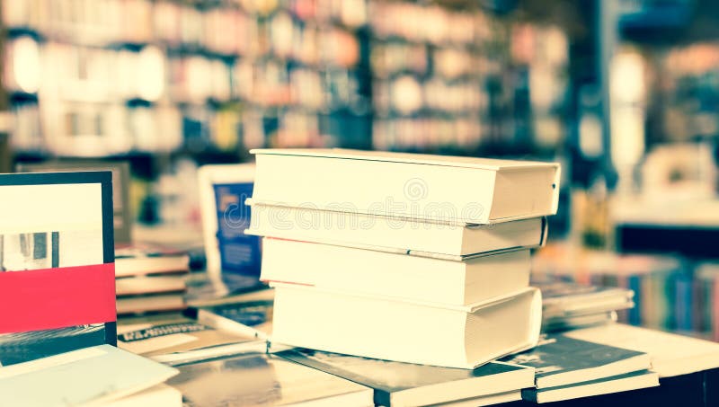 Stack of Books Lying on Table in Bookstore Stock Image - Image of ...