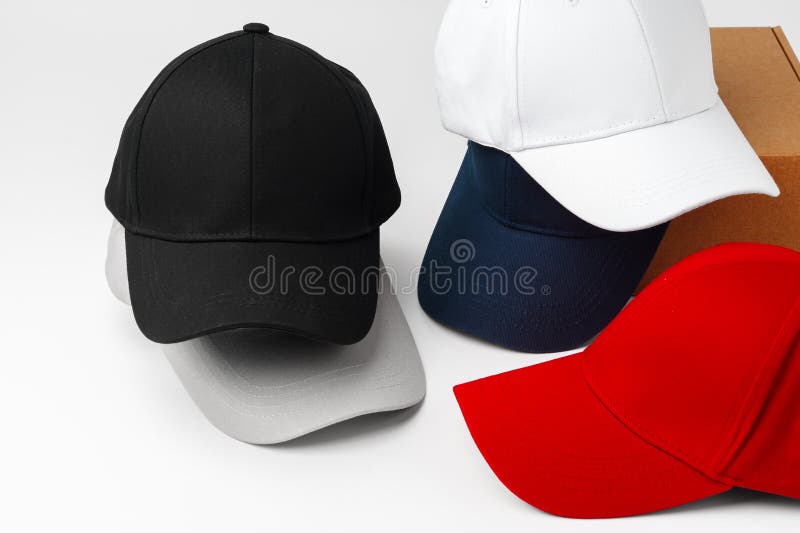 Stack of Assorted Baseball Caps on a White Background Stock Image ...
