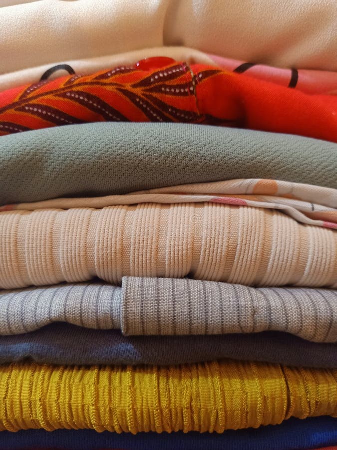 A Stack of Ironed and Folded Clothes Stock Photo - Image of cotton ...