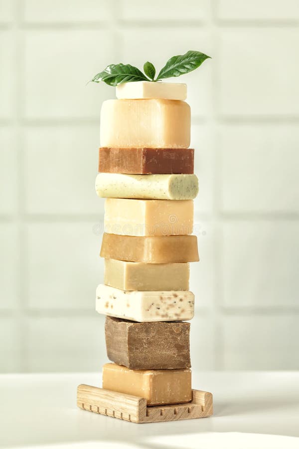 Stack of Assorted Natural Soap Bars on White Bathroom Countertop Stock ...