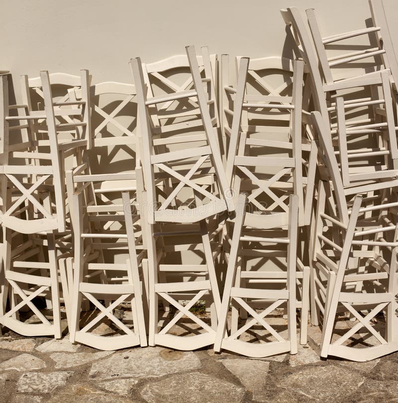 Stack of Assorted Wooden Chairs in Random Disarray, Full Frame ...