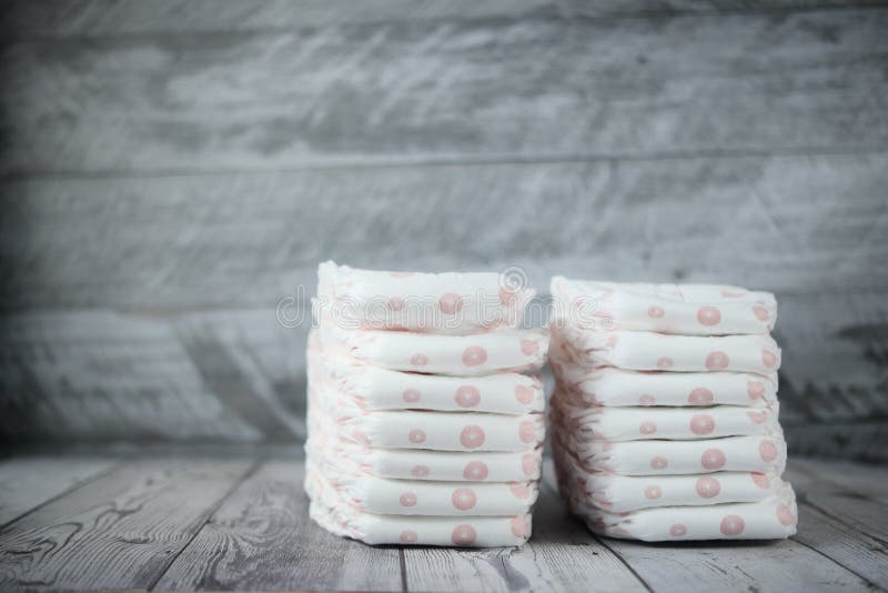 Stack of Baby Diaper on Table, Stock Image - Image of newborn, nappy ...