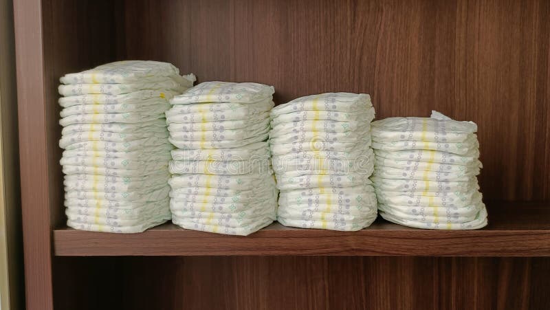 Stack of Baby Diapers on a Shelf. Stock Image - Image of diapers ...