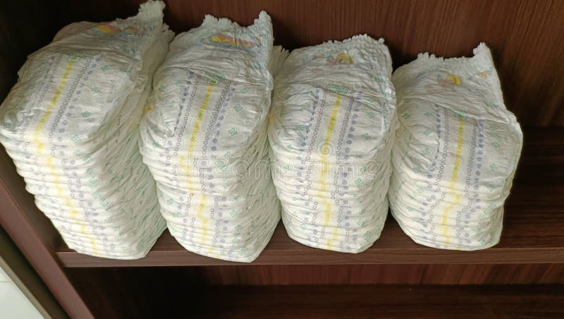 Stack of Baby Diapers on a Shelf. Stock Photo - Image of comfort, tool ...