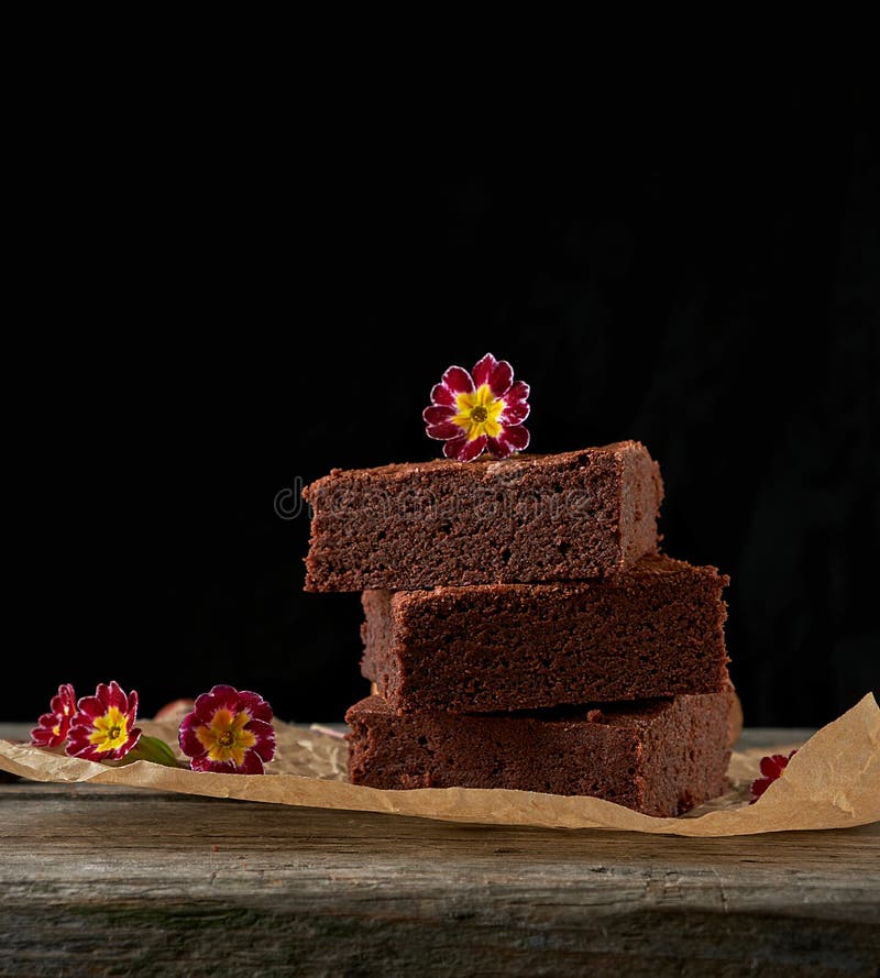 Stack of Baked Square Pieces of Chocolate Brownie Cake Stock Photo ...