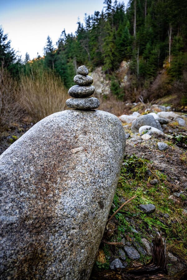 Stack of Balance Stones on a Piece of Rock Stock Photo - Image of ...