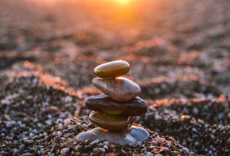 Stack of Balanced Stones on the Beach Stock Photo - Image of sand ...