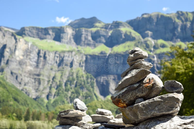 Stack of Balancing Rocks Symbolising Peace and Mindfulness Over a Lush ...