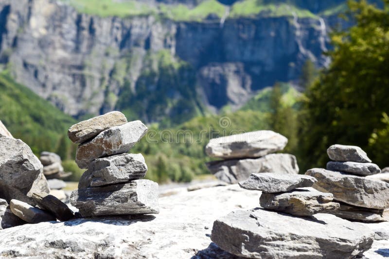 Stack of Balancing Rocks Symbolising Peace and Mindfulness Over a Lush ...
