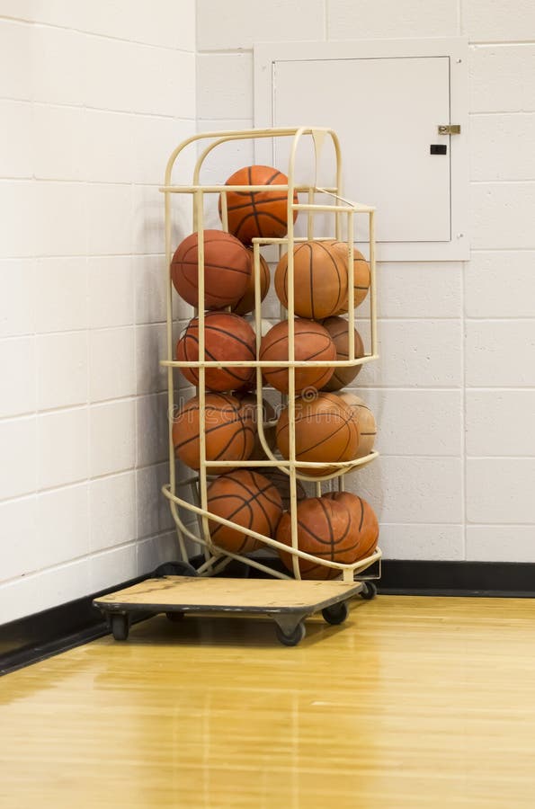 Stack of Basketballs in Wire Holder in Gym Corner Stock Photo - Image ...