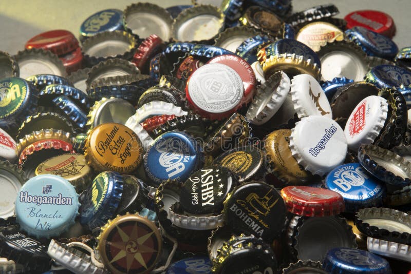 Stack of beer bottle caps editorial photography. Image of metal - 167812362