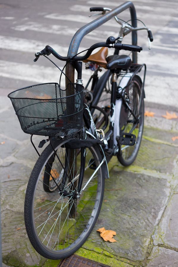 Stack of Bicycles Parked Near the Bike Lane Stock Image - Image of ...