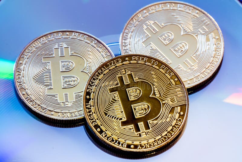 Physical Bitcoin Tokens on Reflective Surface Stock Photo - Image of ...