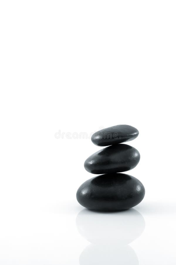 Stack of black pebbles stock photo. Image of massage - 76823822