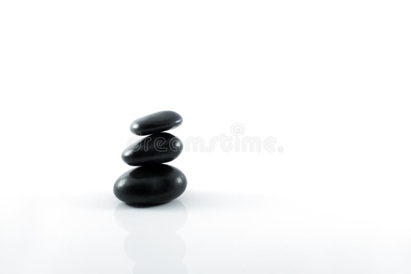 Stack of black pebbles stock image. Image of peaceful - 76823839