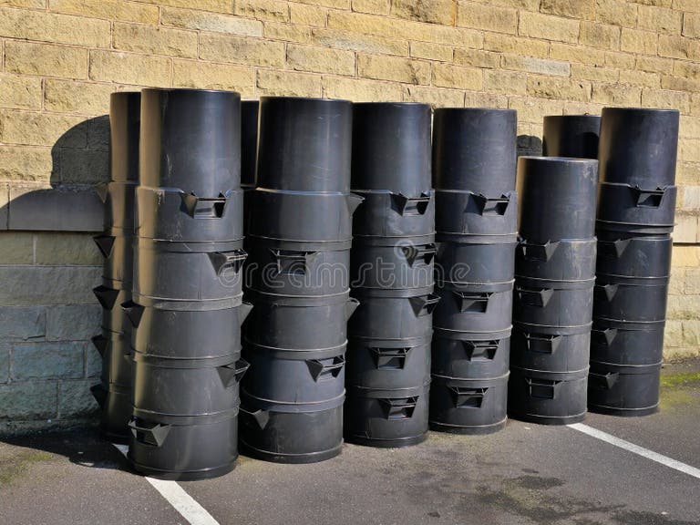 Stack of Black Rubbish Bins Editorial Image - Image of black, wall ...