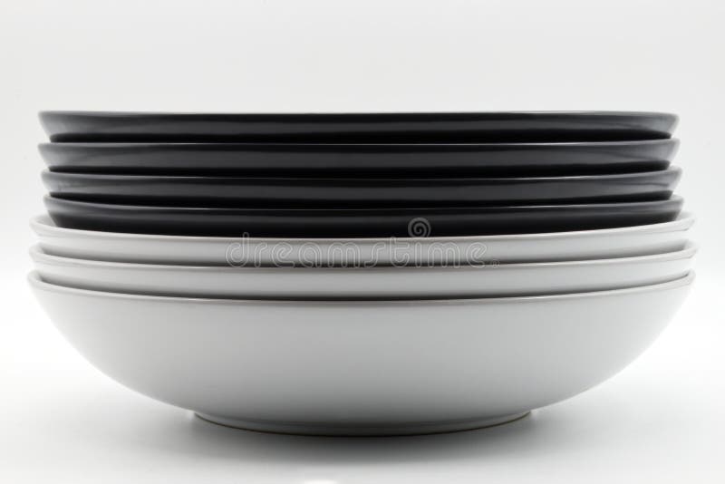Stack of Black Dishes Isolated on White Background Stock Image - Image ...