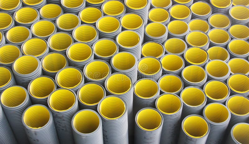 Stack of Black Yellow Corrugated Plastic Pipes Stock Image - Image of ...