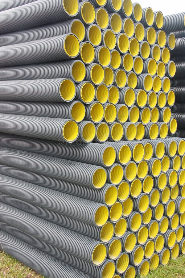 Stack of Black Yellow Corrugated Plastic Pipes Stock Image - Image of ...