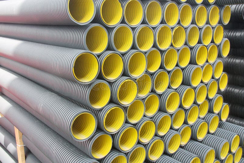 Stack of Black Yellow Corrugated Plastic Pipes Stock Photo - Image of ...