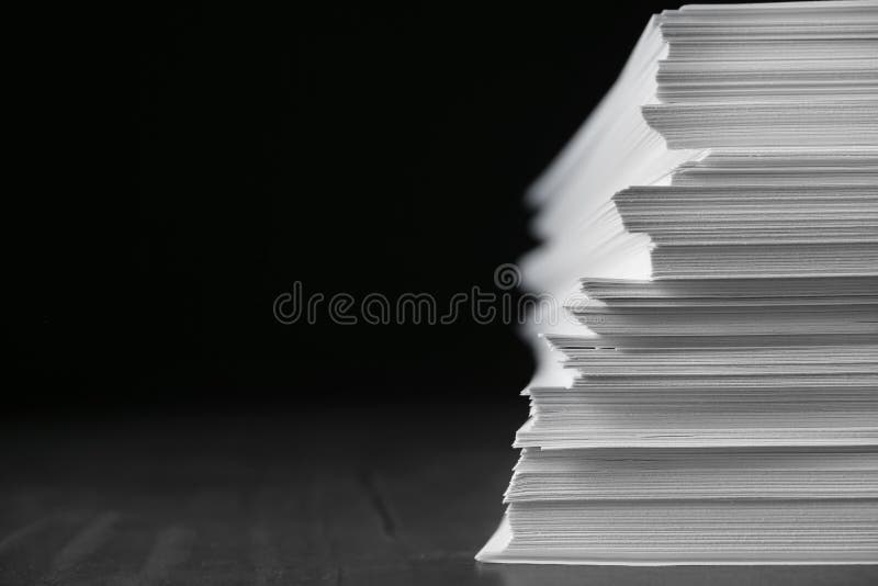 Stack of Blank Paper on Grey Stone Table Against Background. Space for ...