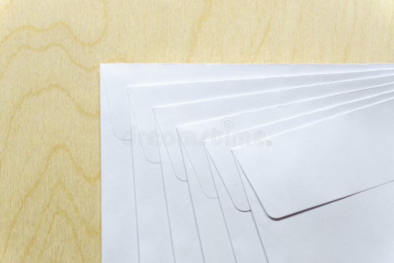 Blank White Envelopes on Wooden Desk Stock Image - Image of ...