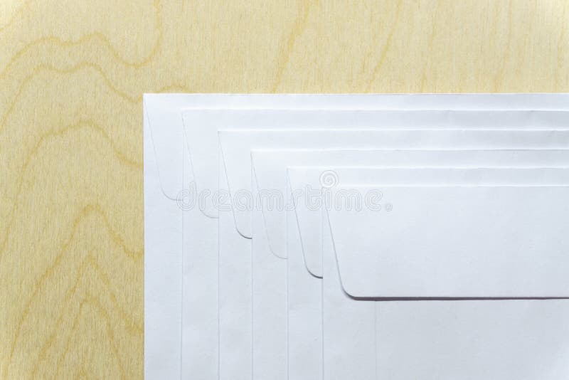 Blank White Envelopes on Wooden Desk Stock Photo - Image of mailing ...