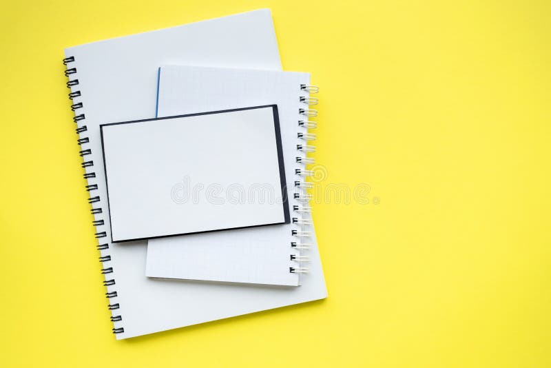 Stack of Blocks and Notebooks with Spiral. Stock Photo - Image of ...