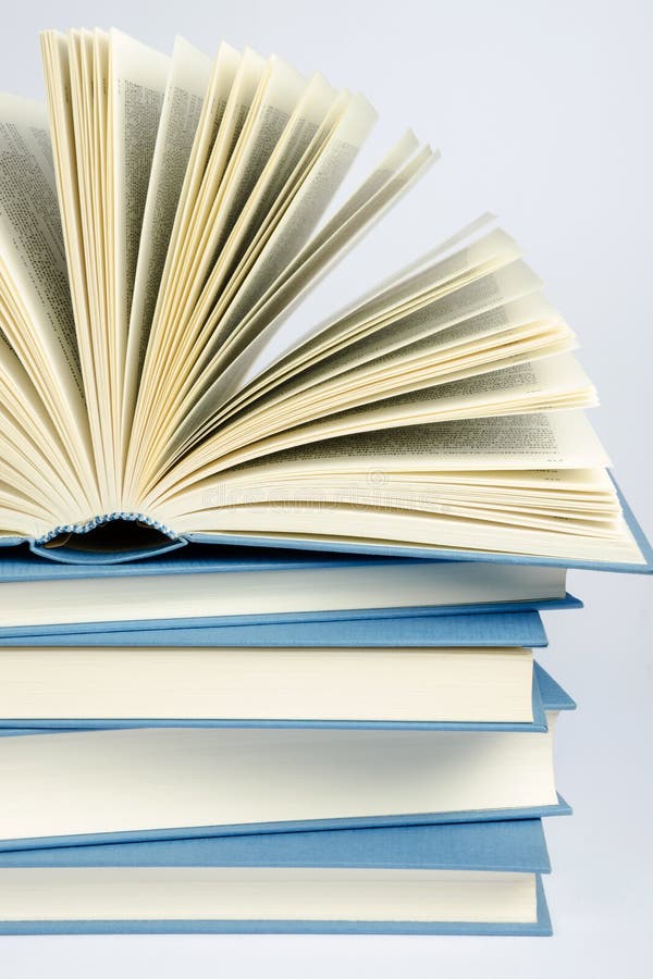 A Group of Blue Books in a Row on a White Background Stock Photo ...
