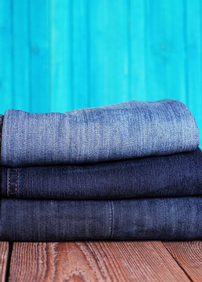 Stack of Blue and Dark Blue Jeans Stock Image - Image of folded ...