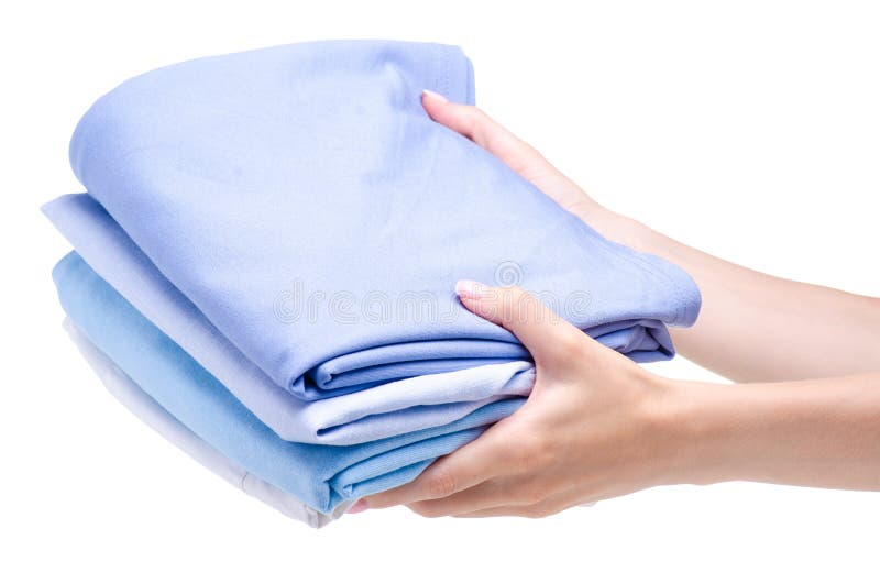 Stack Blue Folded Clothing in Hand Stock Image - Image of apparel ...
