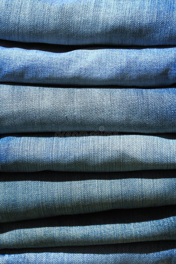 Stack of blue jeans stock photo. Image of denim, fabric - 11643256
