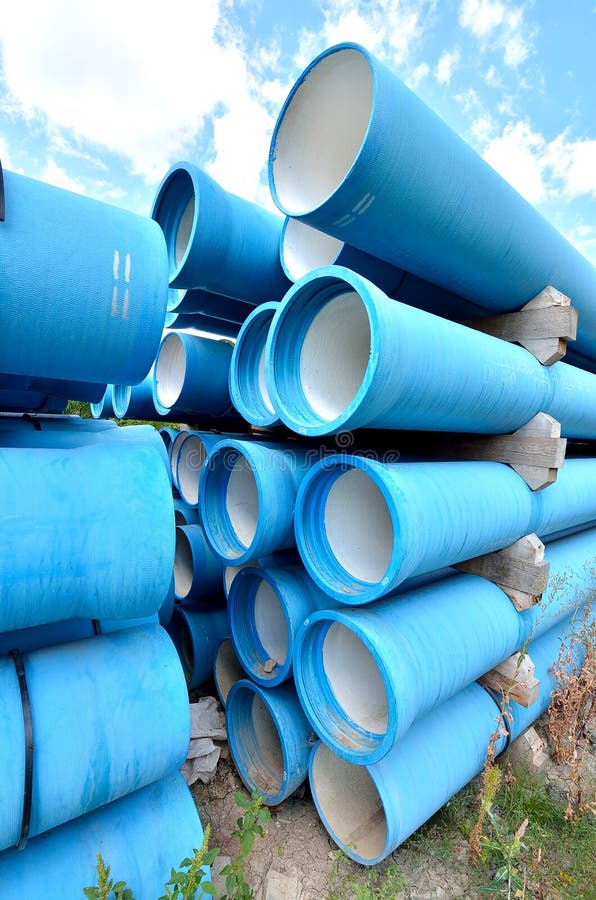 Stack of blue pipes stock photo. Image of concept, metallic - 33261092