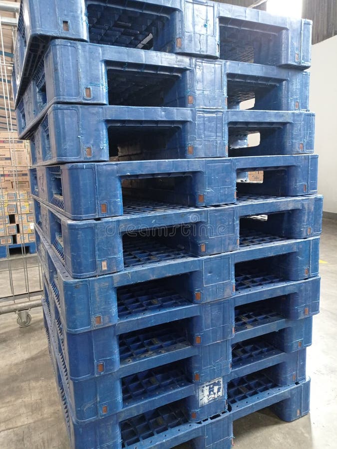 Stack of Blue Plastic Pallets for Warehouse and Shipping Purposes Stock ...