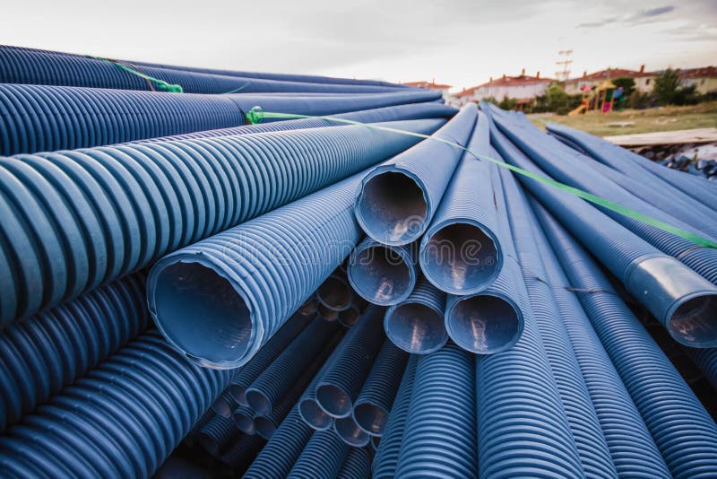 Stack of Blue Pvc Pipes stock image. Image of electricity - 38996695