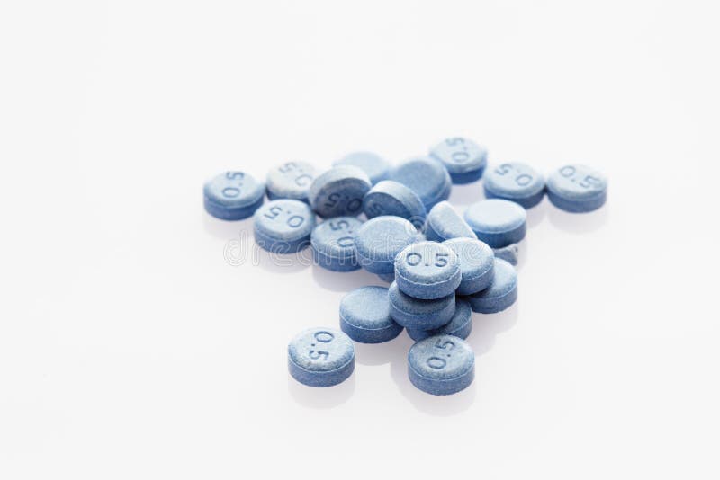 Stack of blue tablets stock image. Image of pharmaceutical - 50490053