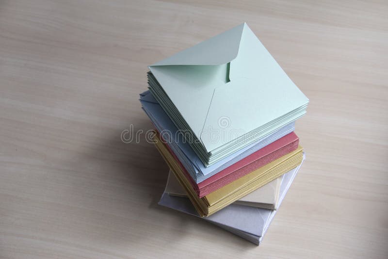 Stack of Colored Envelopes on the Table Stock Photo - Image of open ...