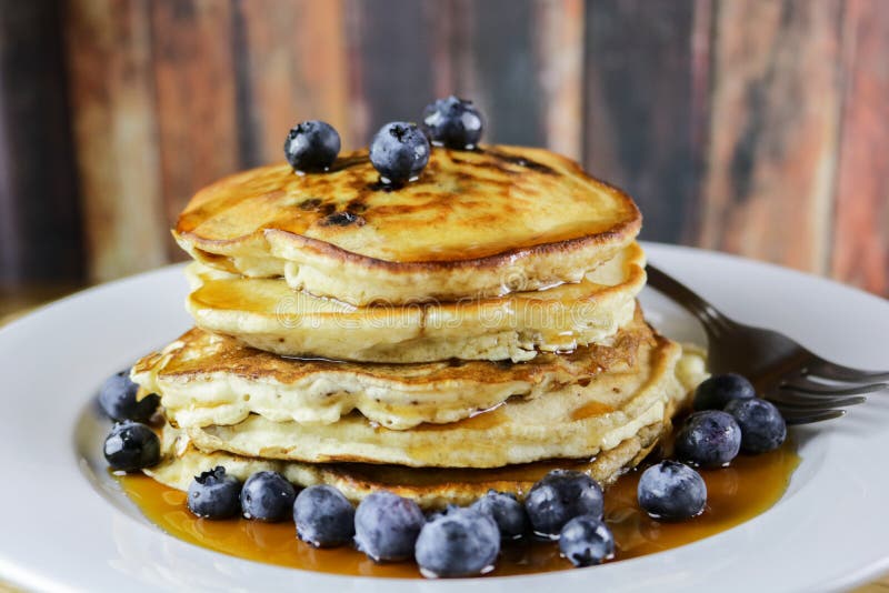 A Stack of Blueberry Pancakes Stock Photo - Image of syrup, blue: 156750486