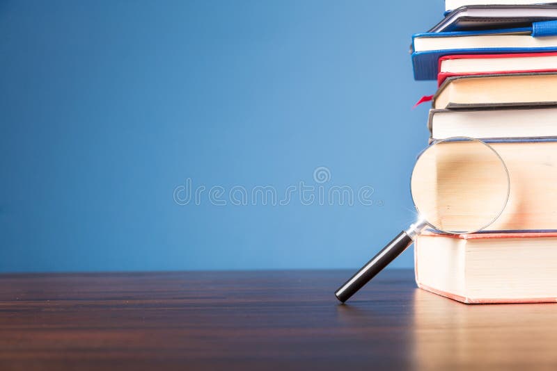 Stack Book with Magnifying Glass on Wooden Desk in Information Library ...