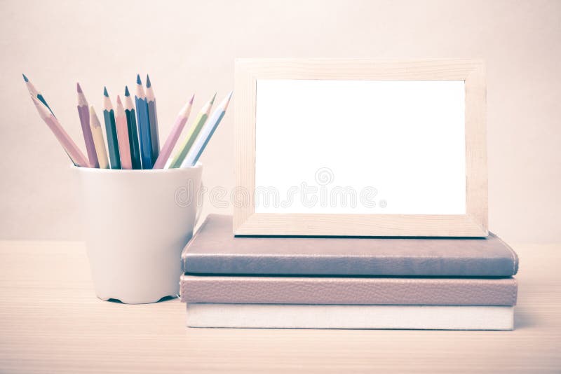 Stack of Book and Photo Frame with Color Pencil Vintage Style Stock ...
