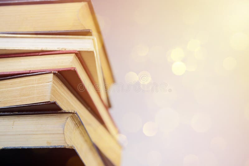 Stack of Books Against Blue Sky. Abstract Blurred Nature Scene Backdrop ...