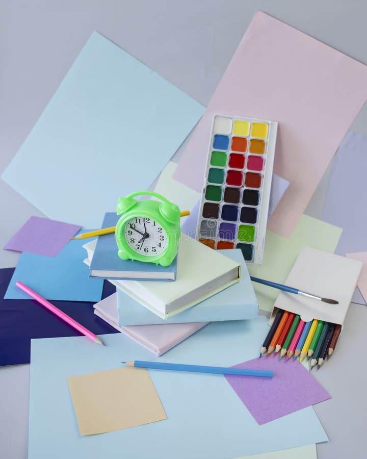 Stack of Books, Alarm Clock, School Supplies and Creative Learning Materials in Pastel Colors ...