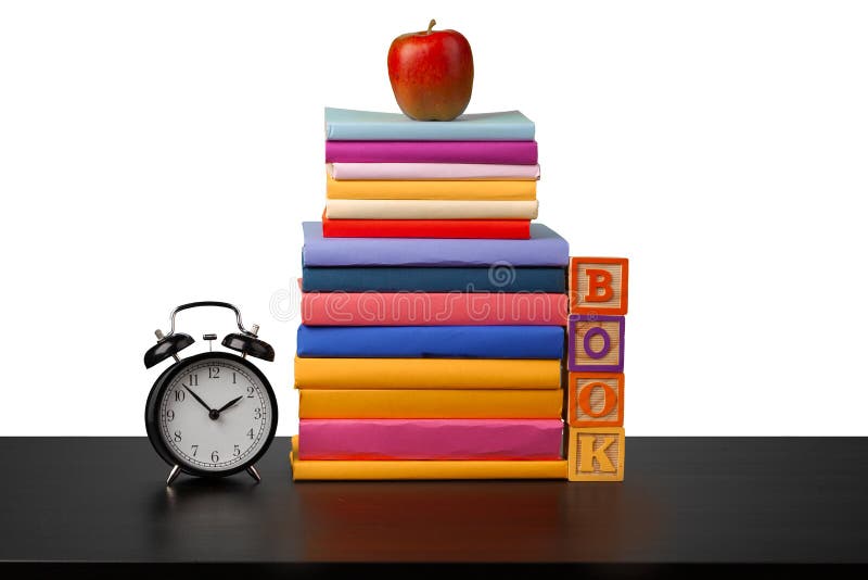 Stack of Books and Alarm Clock, Time To Read Concept Stock Photo ...